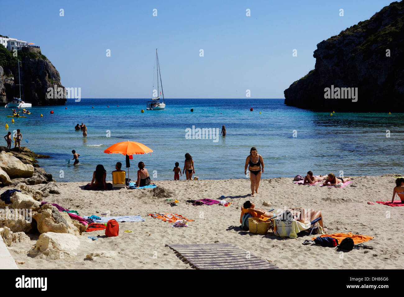 people at the beach, cala en porter, menorca, spain Stock Photo - Alamy