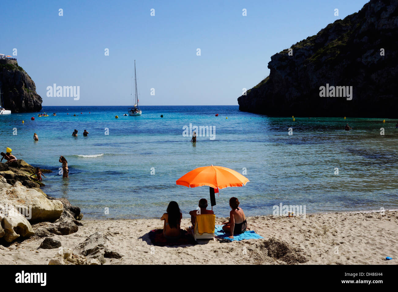 people at the beach, cala en porter, menorca, spain Stock Photo - Alamy
