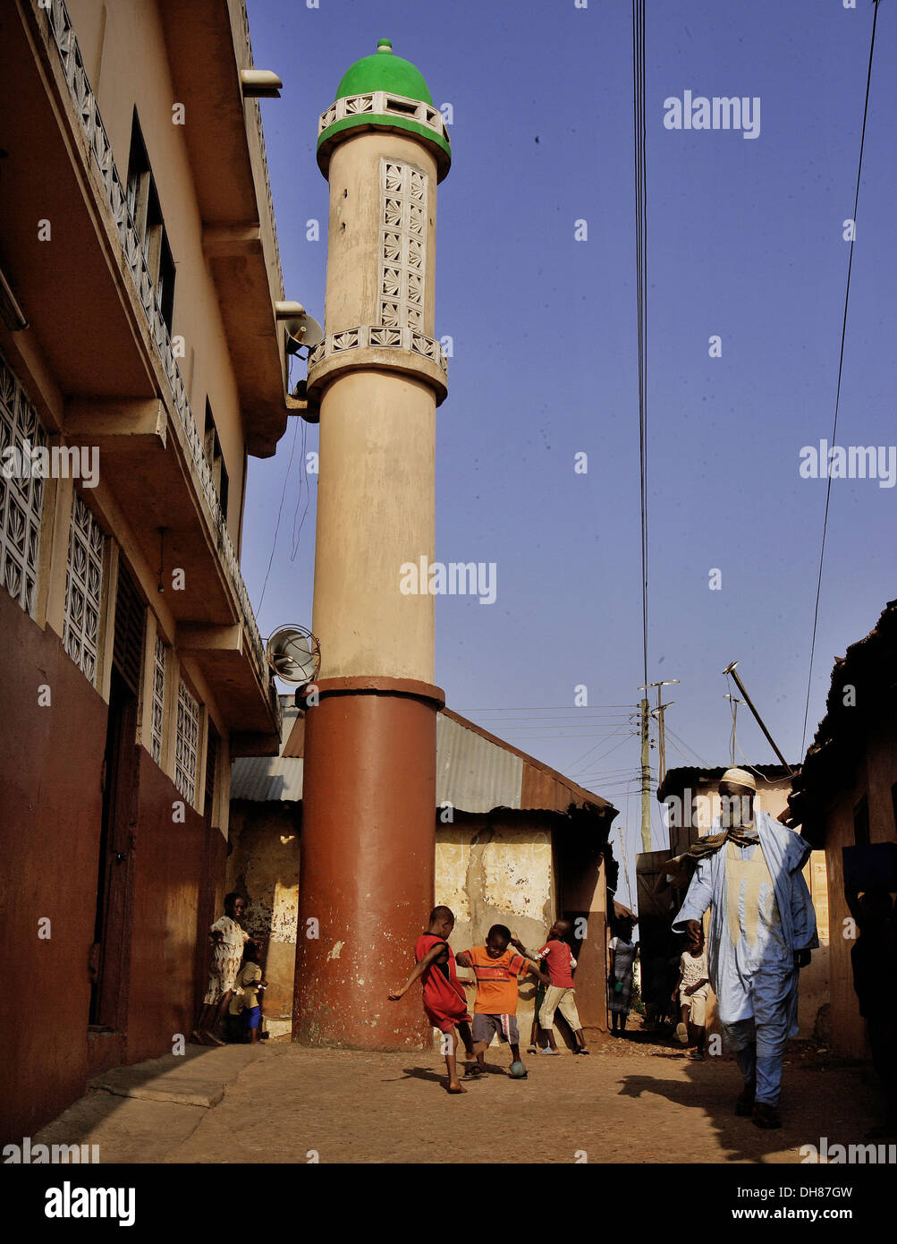 An unidentified children playing football in front of a mosque in Nima ...