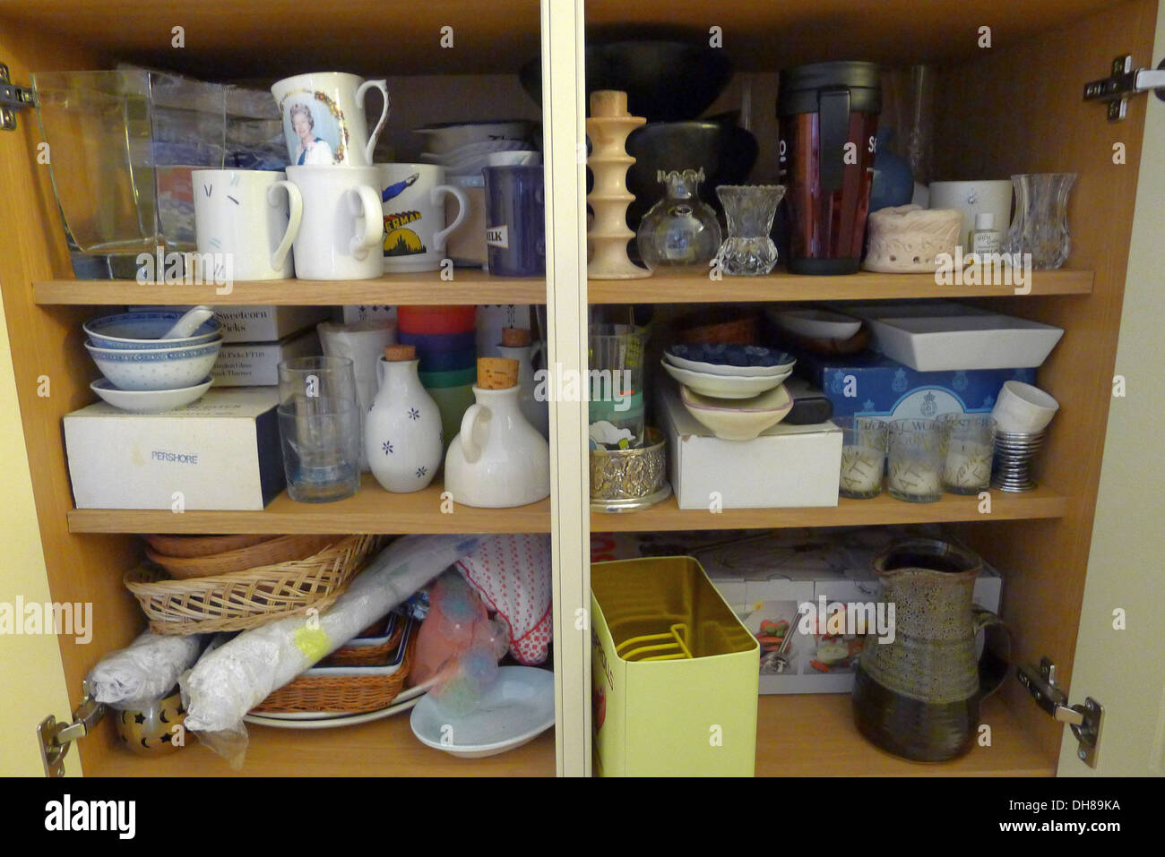 Messy Kitchen Cupboard Stock Photo - Alamy