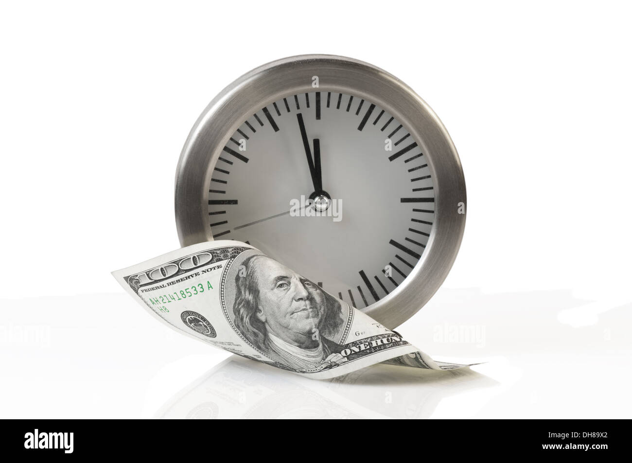 time is money clock and dollars on white background Stock Photo - Alamy