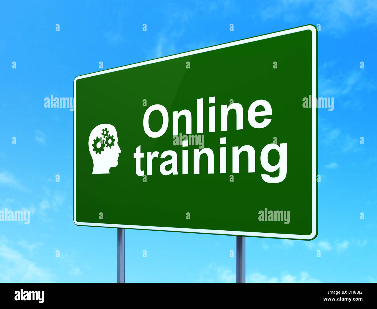 Education concept: Online Training and Head Gears on road sign Stock ...