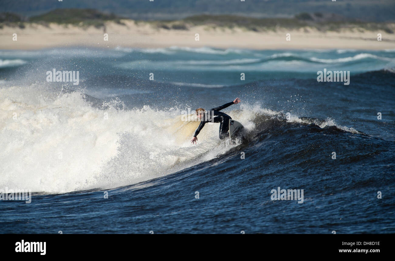 Riding breaking waves hi-res stock photography and images - Alamy