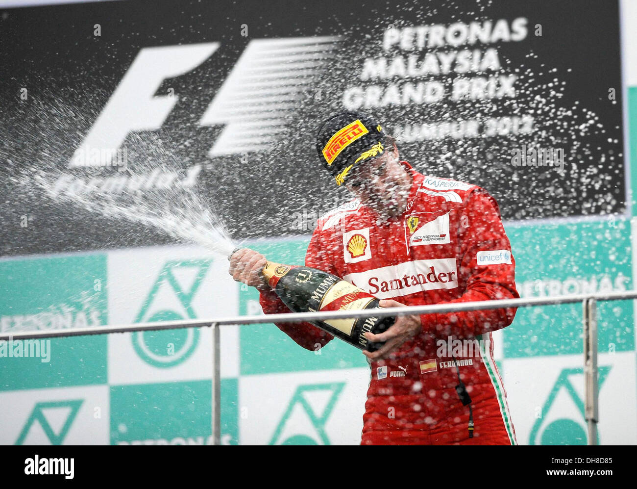 Fernando Alonso celebrates his win after Malaysian mula One Grand Prix ...