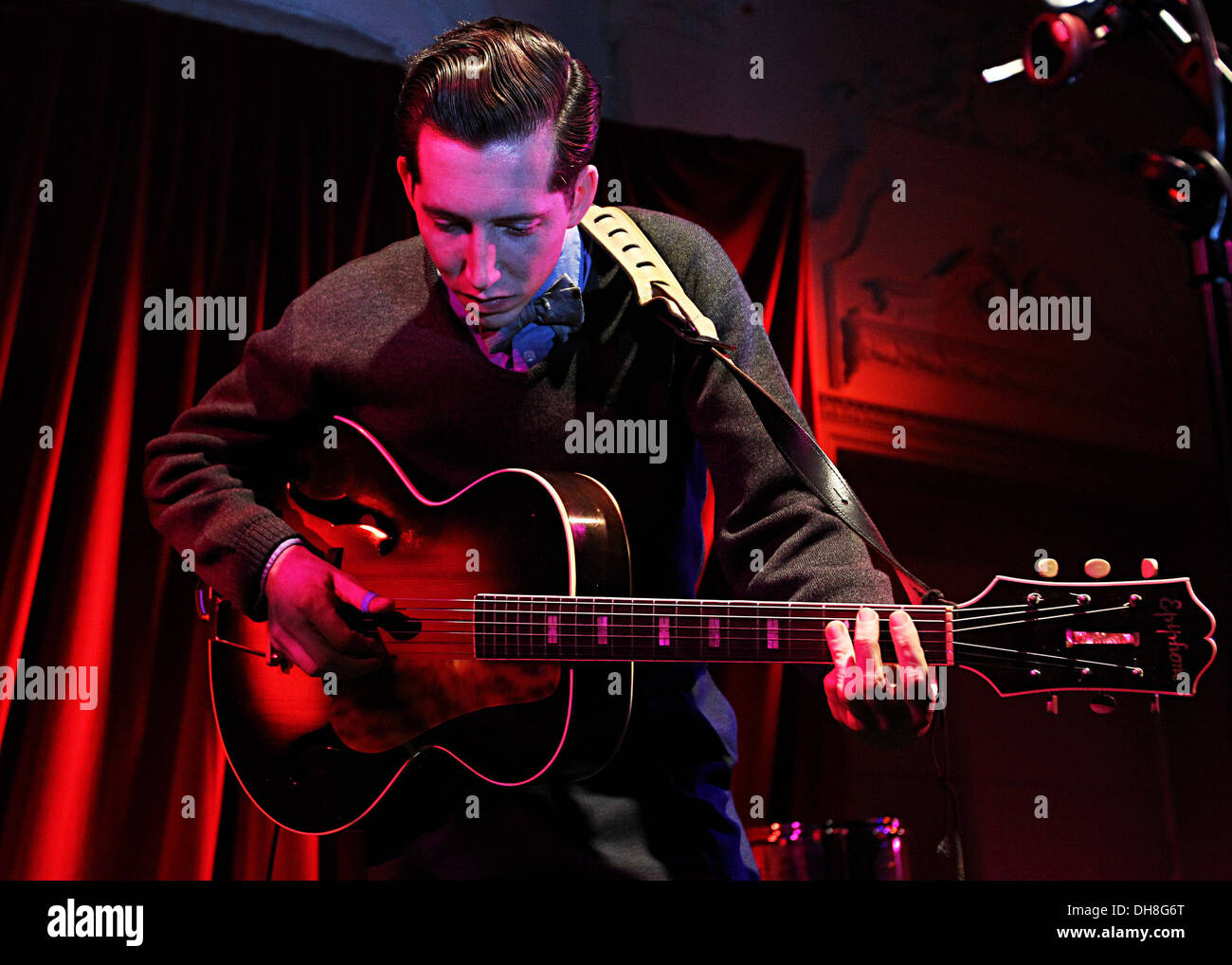 Pokey LaFarge of Pokey LaFarge and South City Three performing on stage ...