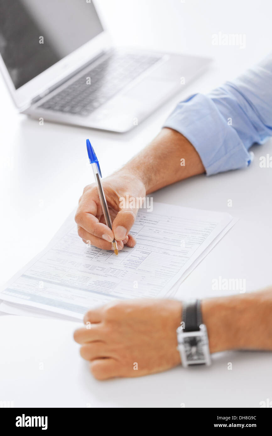 Man signing papers the signature hi-res stock photography and images ...