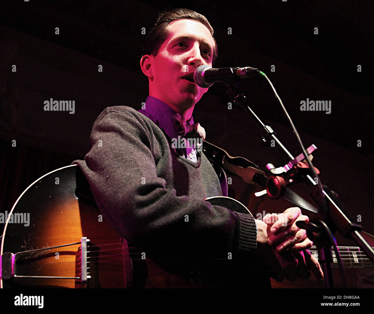 Pokey LaFarge of Pokey LaFarge and South City Three performing on stage ...