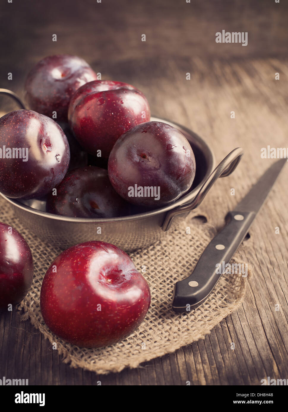 Raw plums hi-res stock photography and images - Alamy
