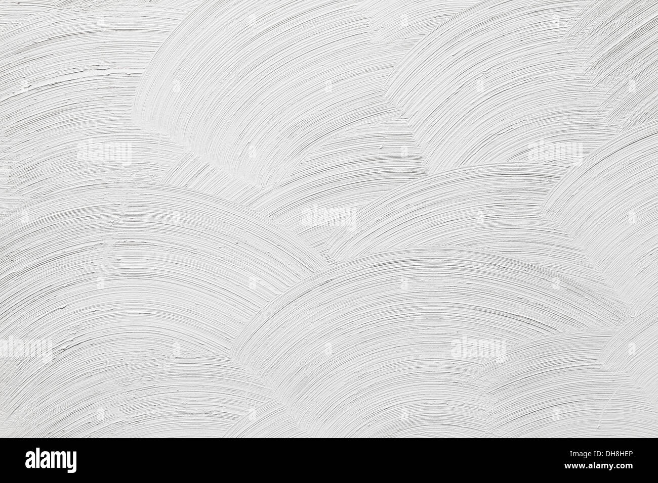 Closeup white concrete wall texture with round plaster decorative ...