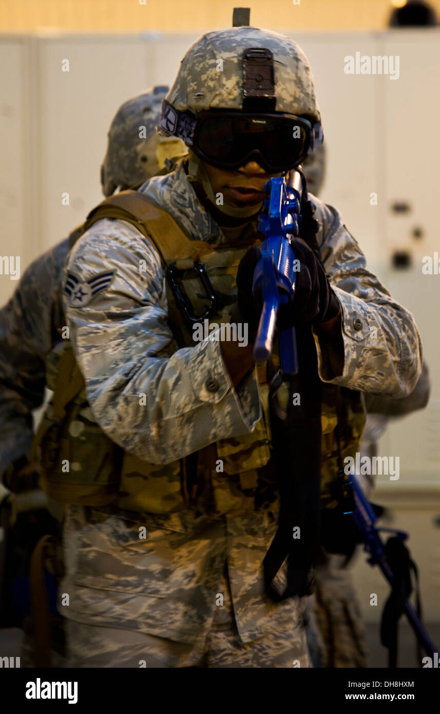 Senior Airman Arthur Moody, 91st Missile Security Forces member, leads ...