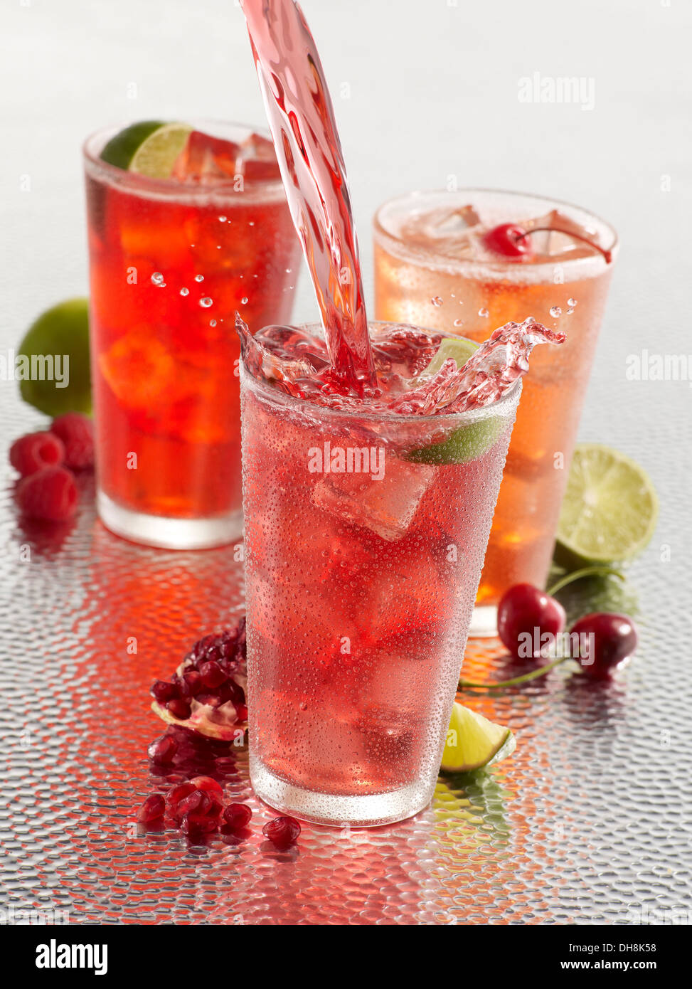 Assorted Fruit Spritzer Drinks with pour Stock Photo - Alamy