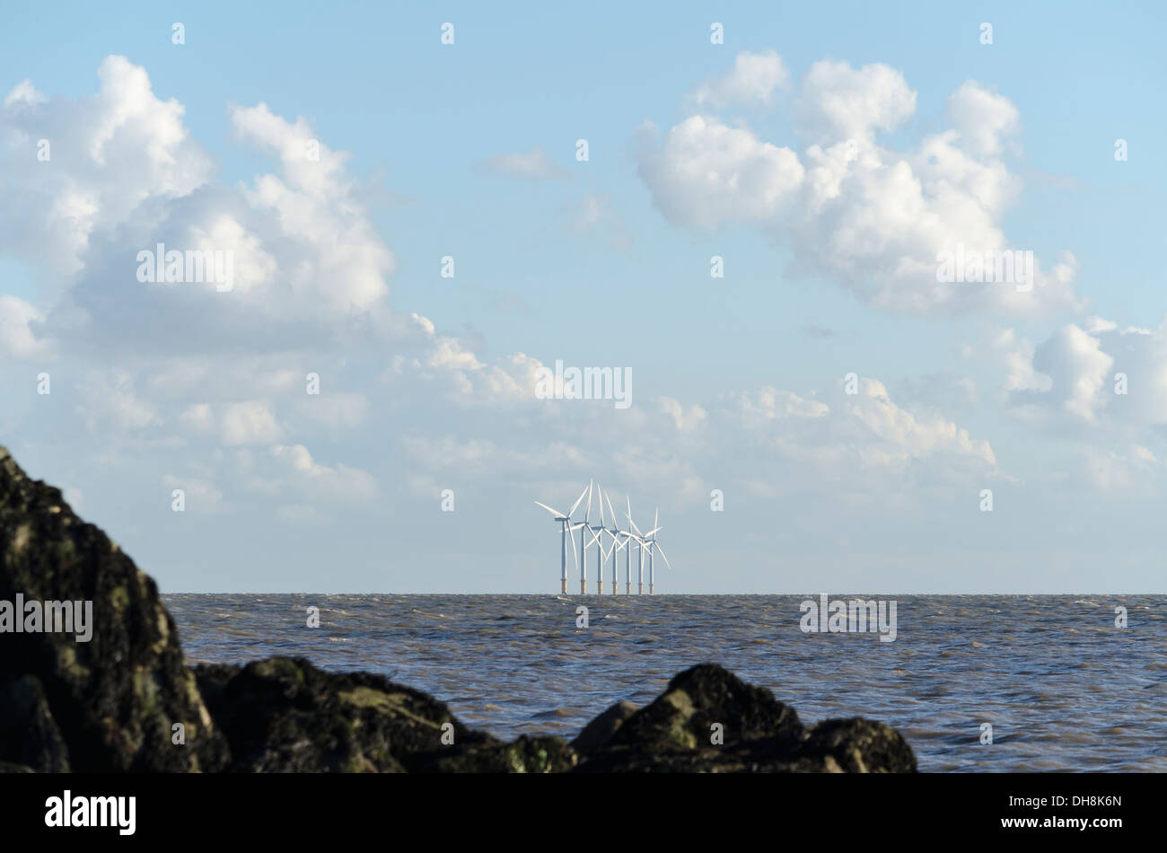 Offshore wind farm with clouds Stock Photo - Alamy