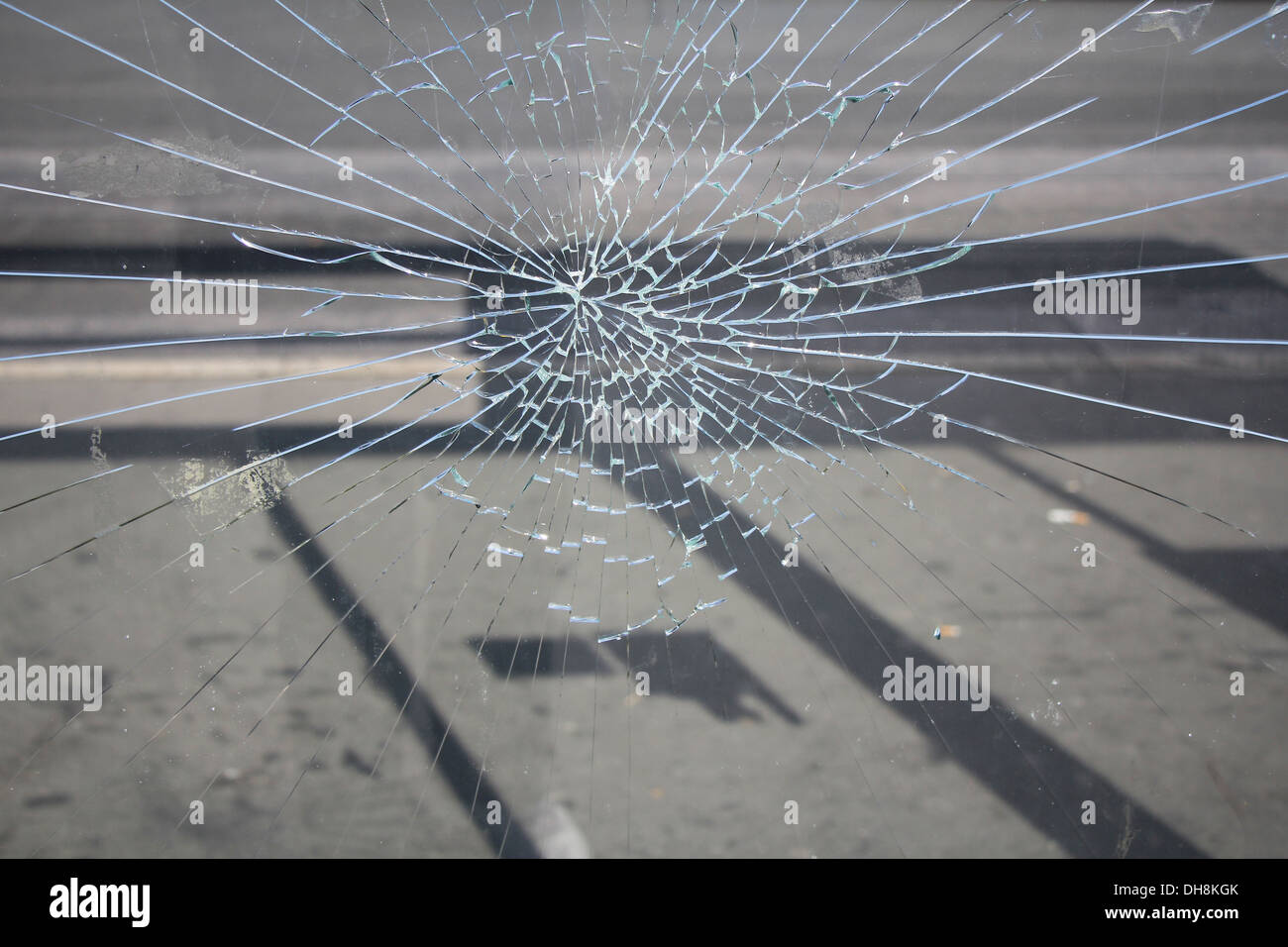 Glass broken cracks splinters in front of the bus station Stock Photo ...
