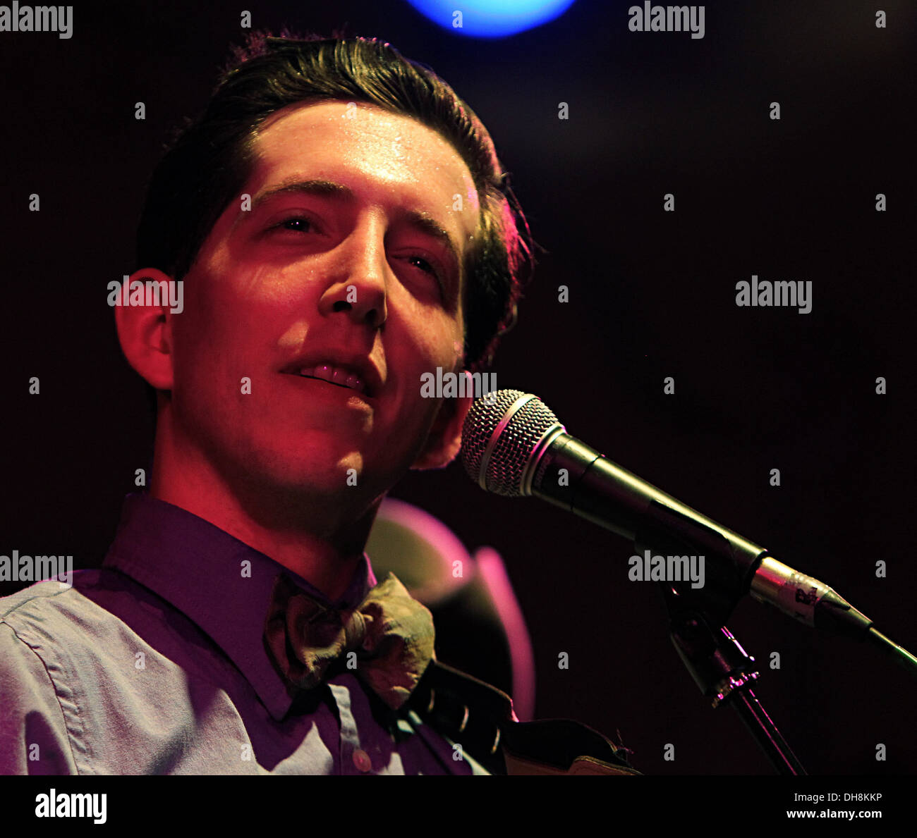 Pokey LaFarge of Pokey LaFarge and South City Three performing on stage ...