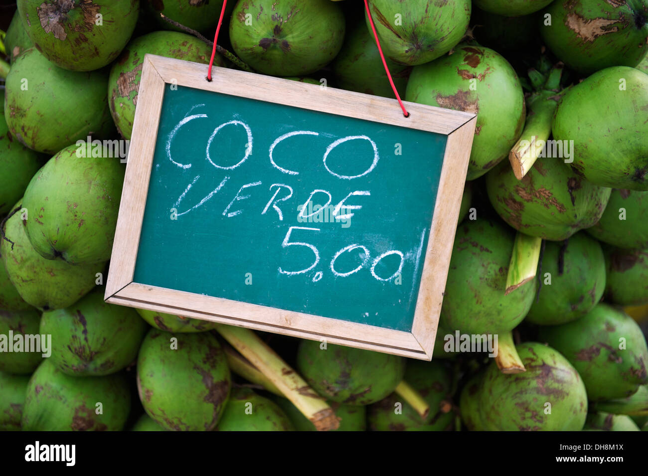 Sign advertises price of green drinking coconuts in Rio de Janeiro ...