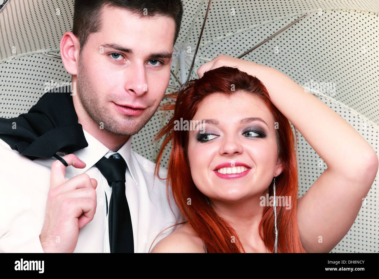 Wedding day. Portrait of happy married couple red haired blue eyed ...
