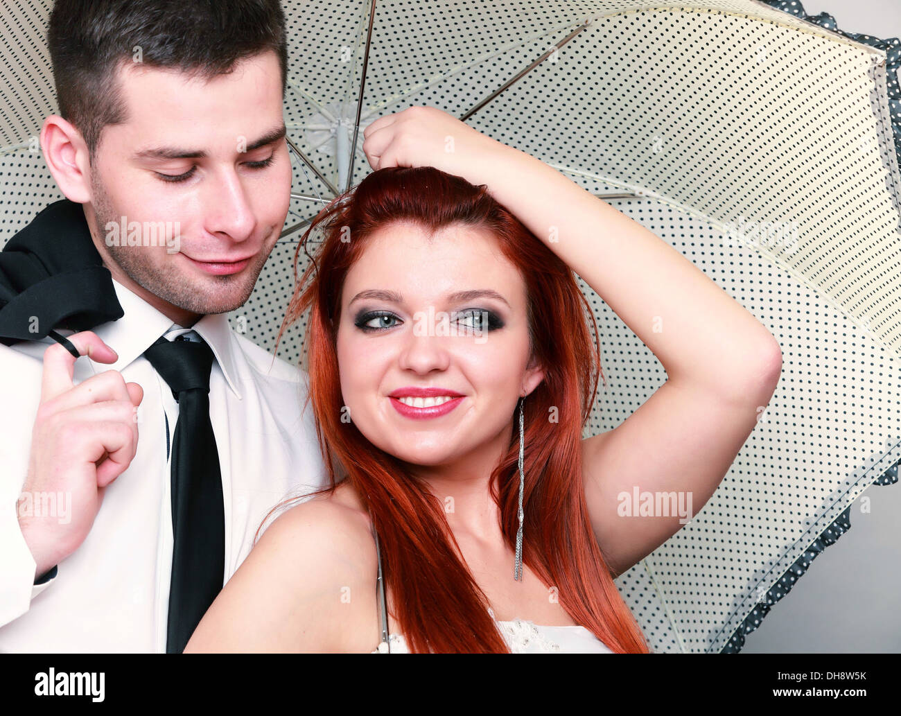 Wedding day. Portrait of happy married couple red haired blue eyed ...