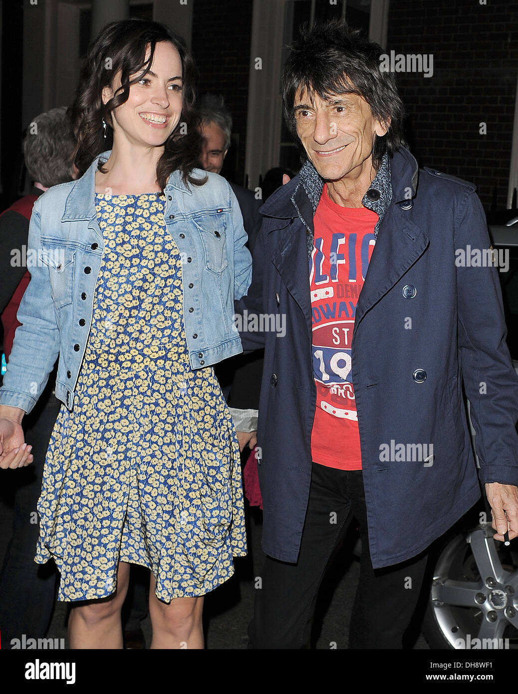 Ronnie Wood and a female companion leaving The Arts Club. London ...