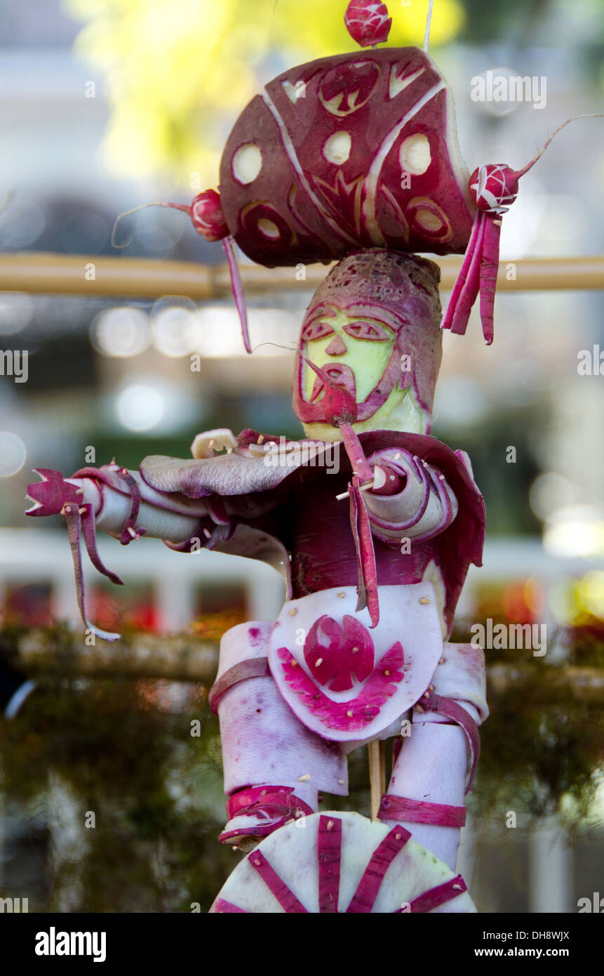 A Guelaguetza dancer carved from radishes at the Noche de Rabanos ...