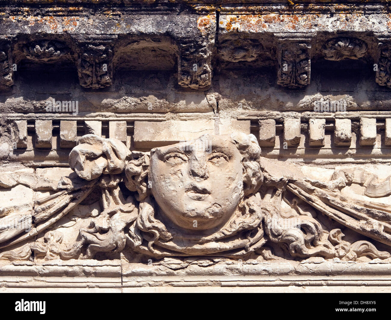 Old stone face carving decoration detail - France Stock Photo - Alamy