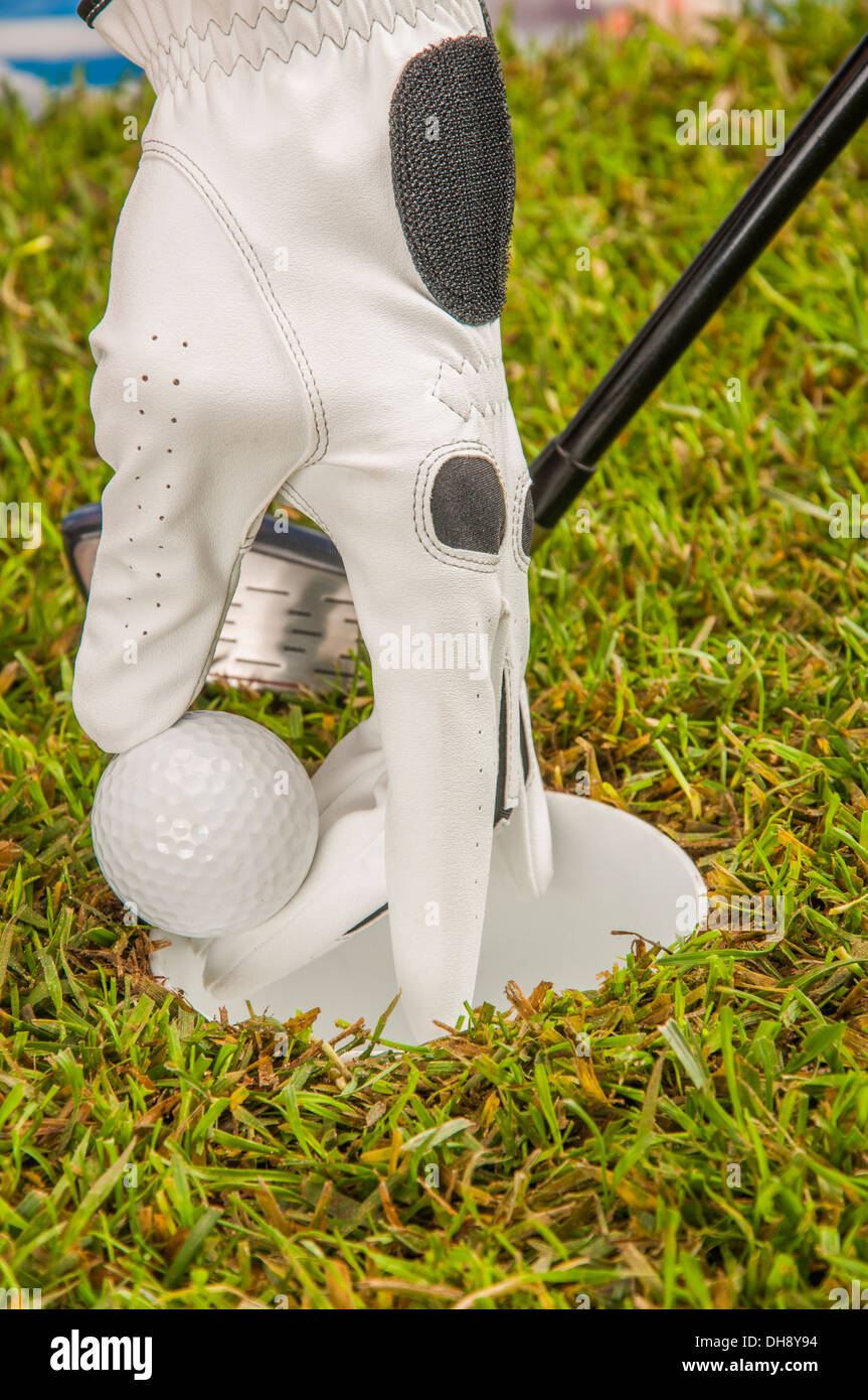 Golf stuff on green grass Stock Photo - Alamy