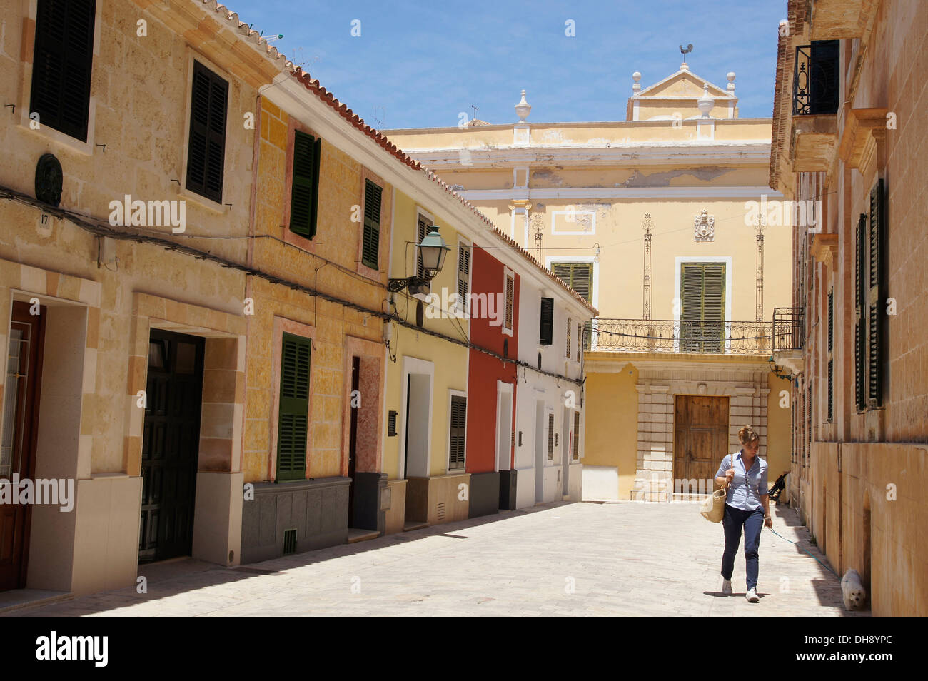 Woman walking street of facades hi-res stock photography and images - Alamy