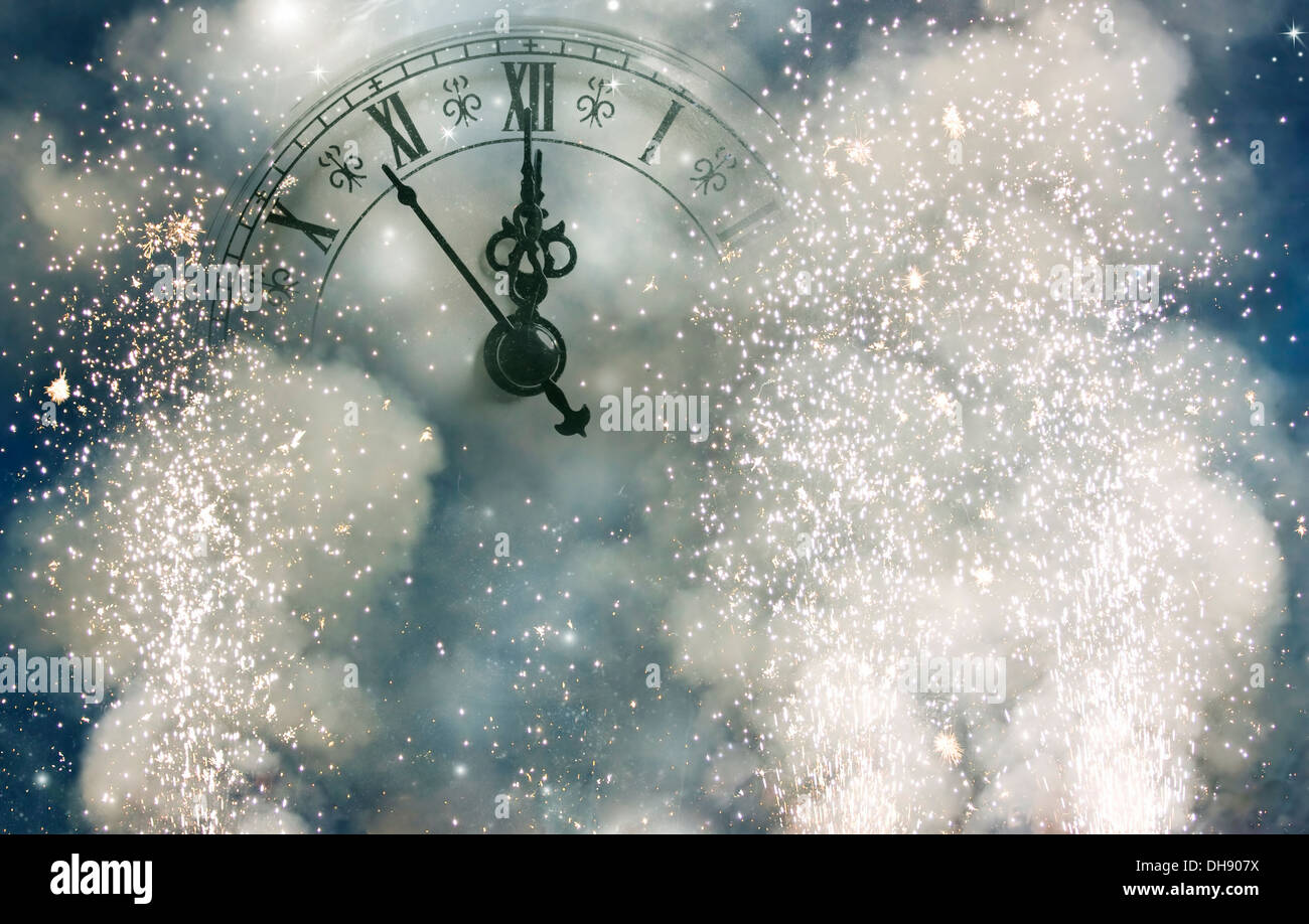 Vintage clock on holiday background Stock Photo - Alamy