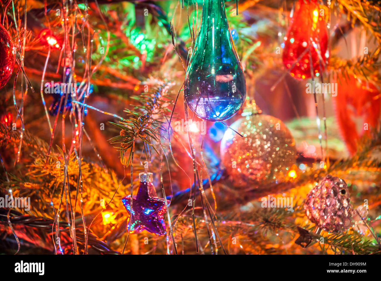 Christmas Tree Decorations With Baubles Fairy Lights And Tinsel Stock