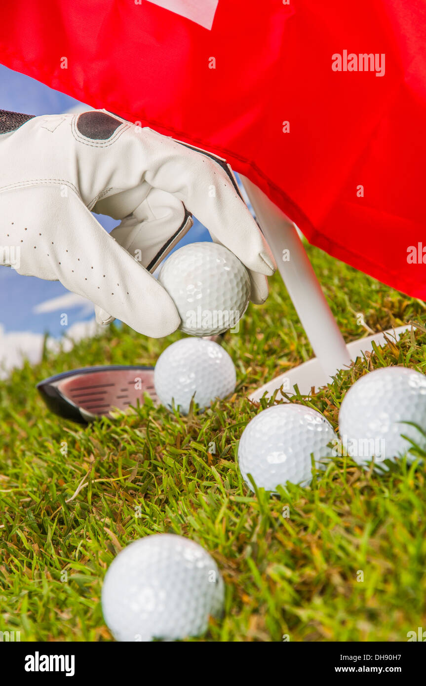 Golf stuff on green grass Stock Photo - Alamy