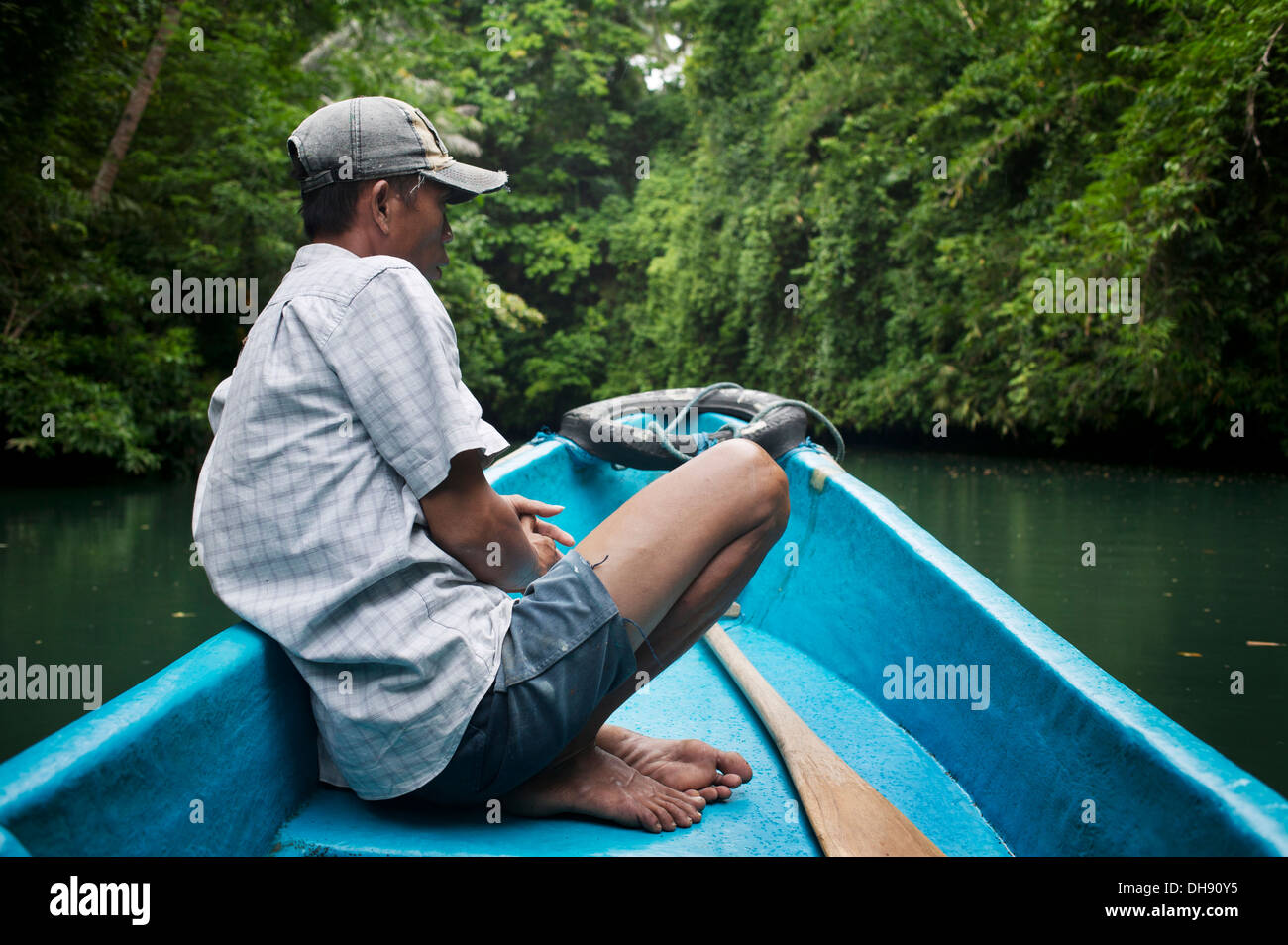 Man riding in a boat hi-res stock photography and images - Alamy