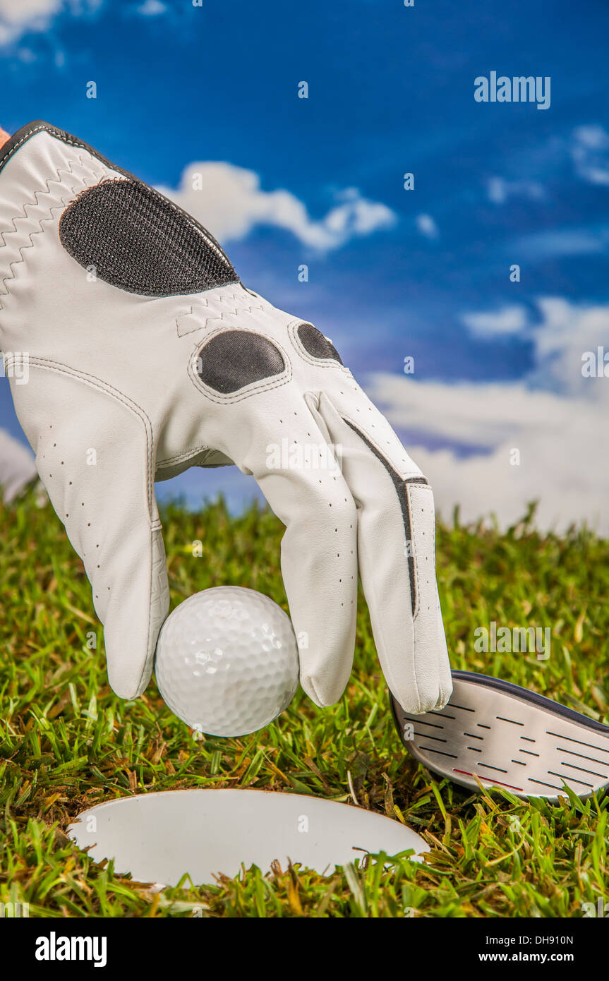 Golf stuff on green grass Stock Photo - Alamy