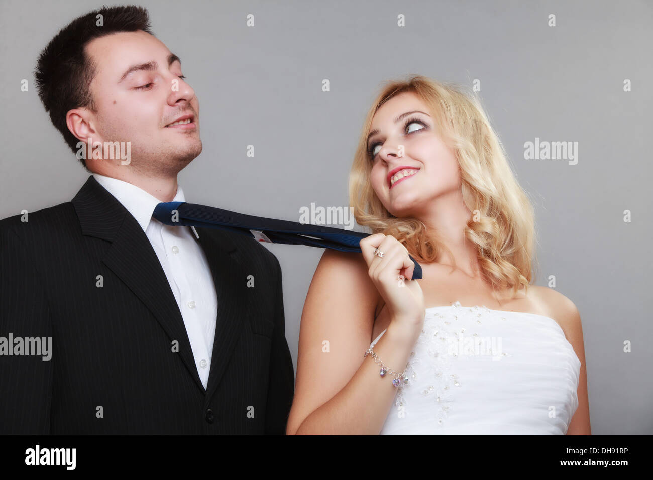 Wedding day. Portrait of happy married couple blonde bride and groom ...