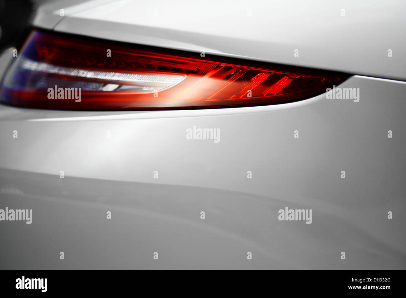Detail on the rear light of a white car Stock Photo - Alamy