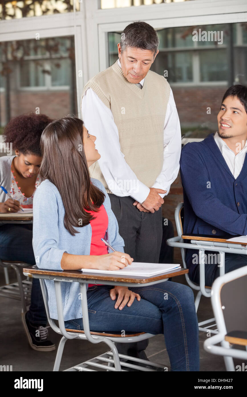 Female teacher giving lecture hi-res stock photography and images - Alamy