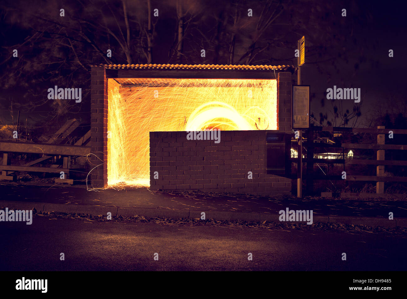 Sparks flying from wire wool on fire Stock Photo - Alamy