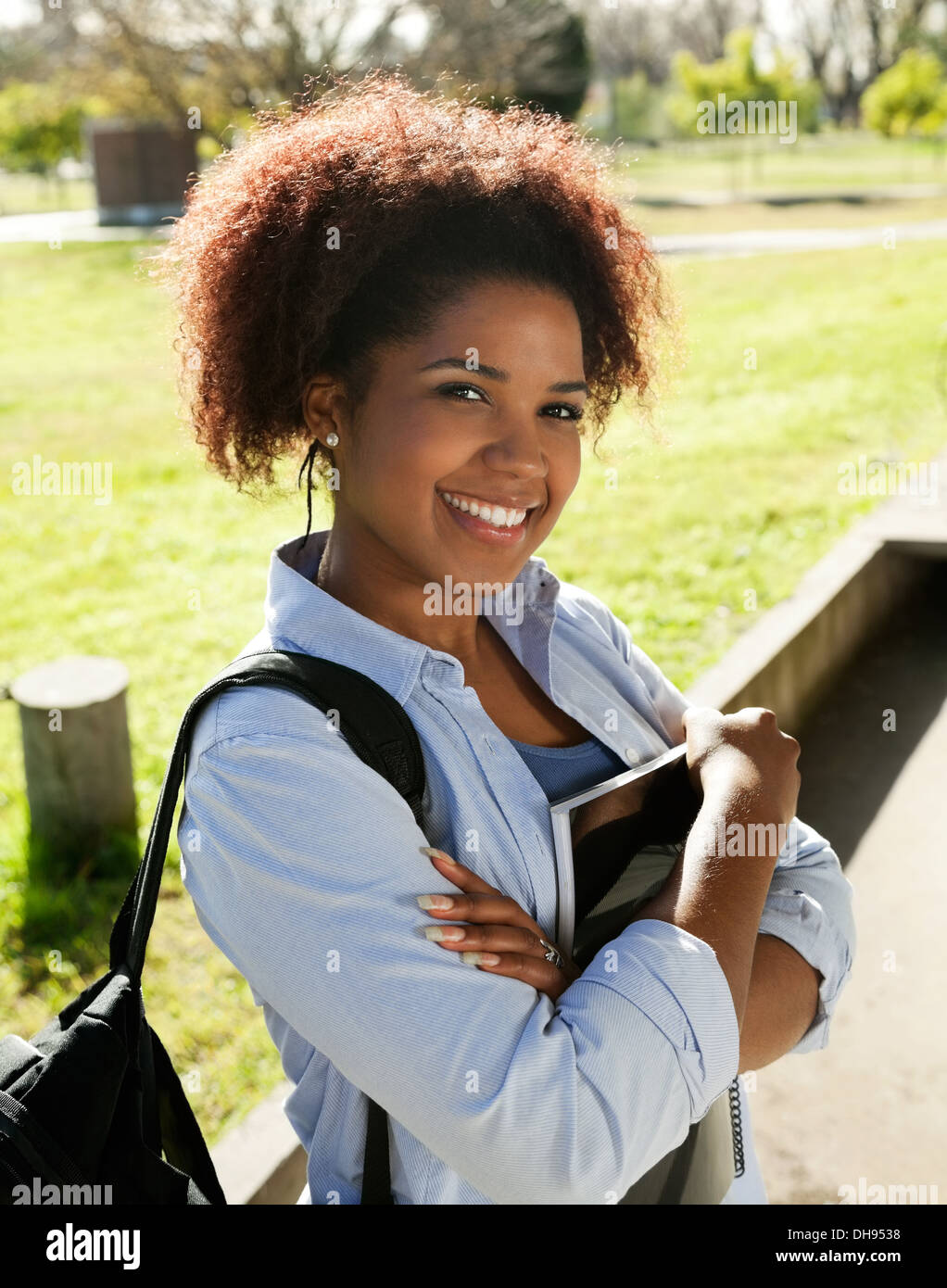 Confident african college student arms hi-res stock photography and images - Alamy
