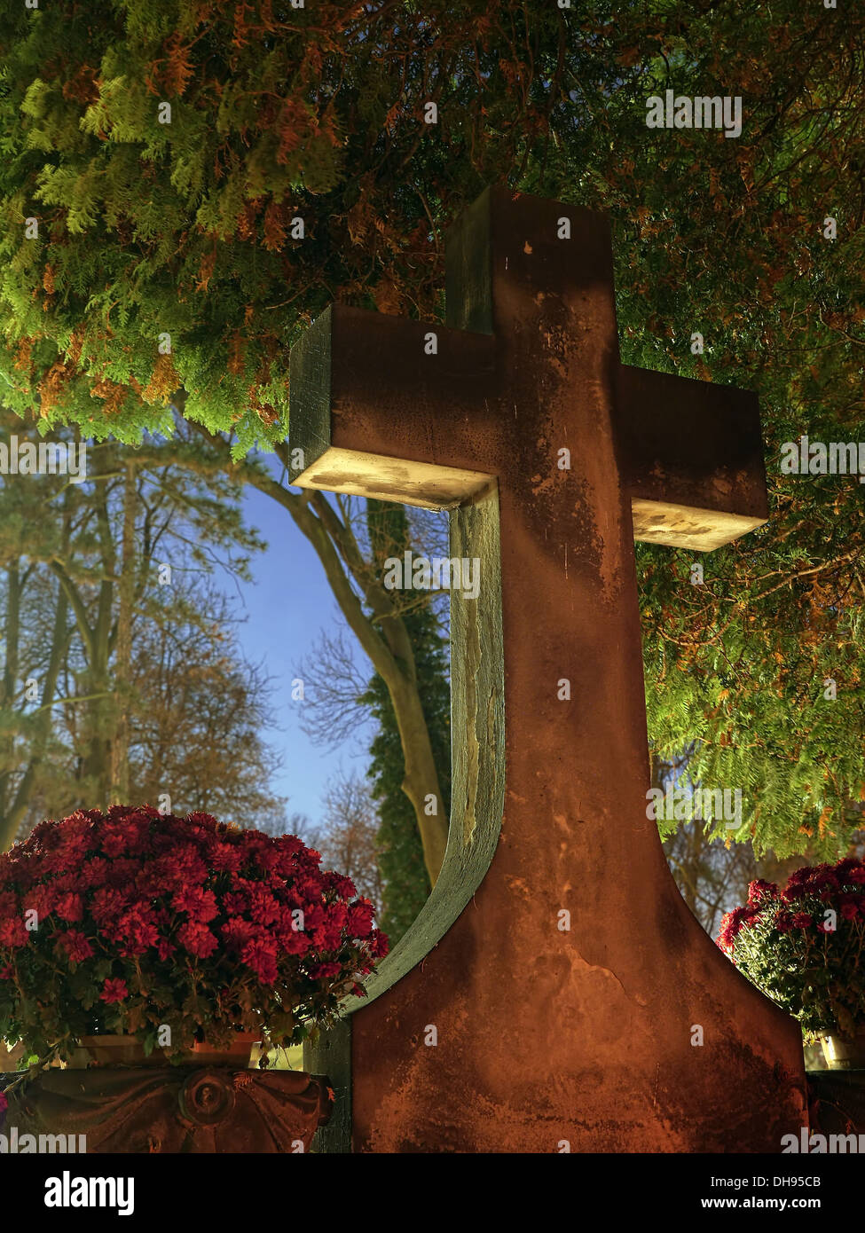 Old tombstone cross in night glow Stock Photo - Alamy