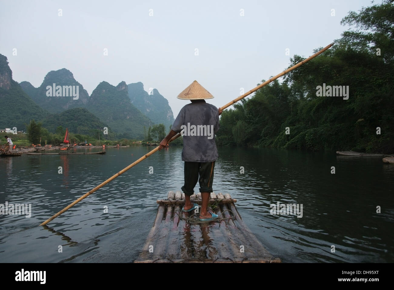 Rafting Down The Yulong River; Yangshuo, Guangxi Province, China Stock ...