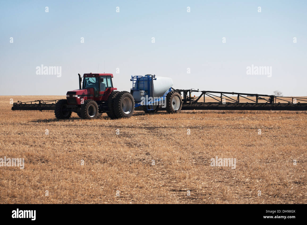 Tractor With Sprayer In Field With Blue Sky; Alberta, Canada Stock ...