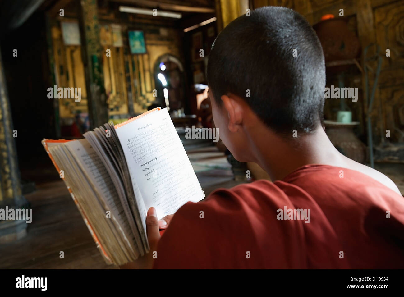 Novice Monk Reading At A Temple; Shan State, Myanmar Stock Photo - Alamy