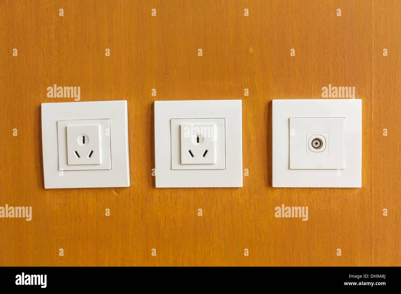 Electric wall plug at a wood wall Stock Photo - Alamy