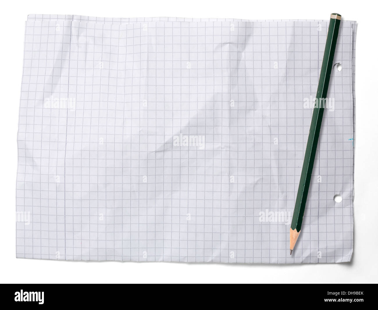 crumpled paper with lines, holes and pencil, isolated on white Stock ...