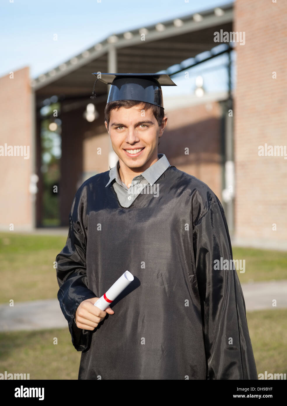 Portrait confident student graduation certificate hi-res stock ...