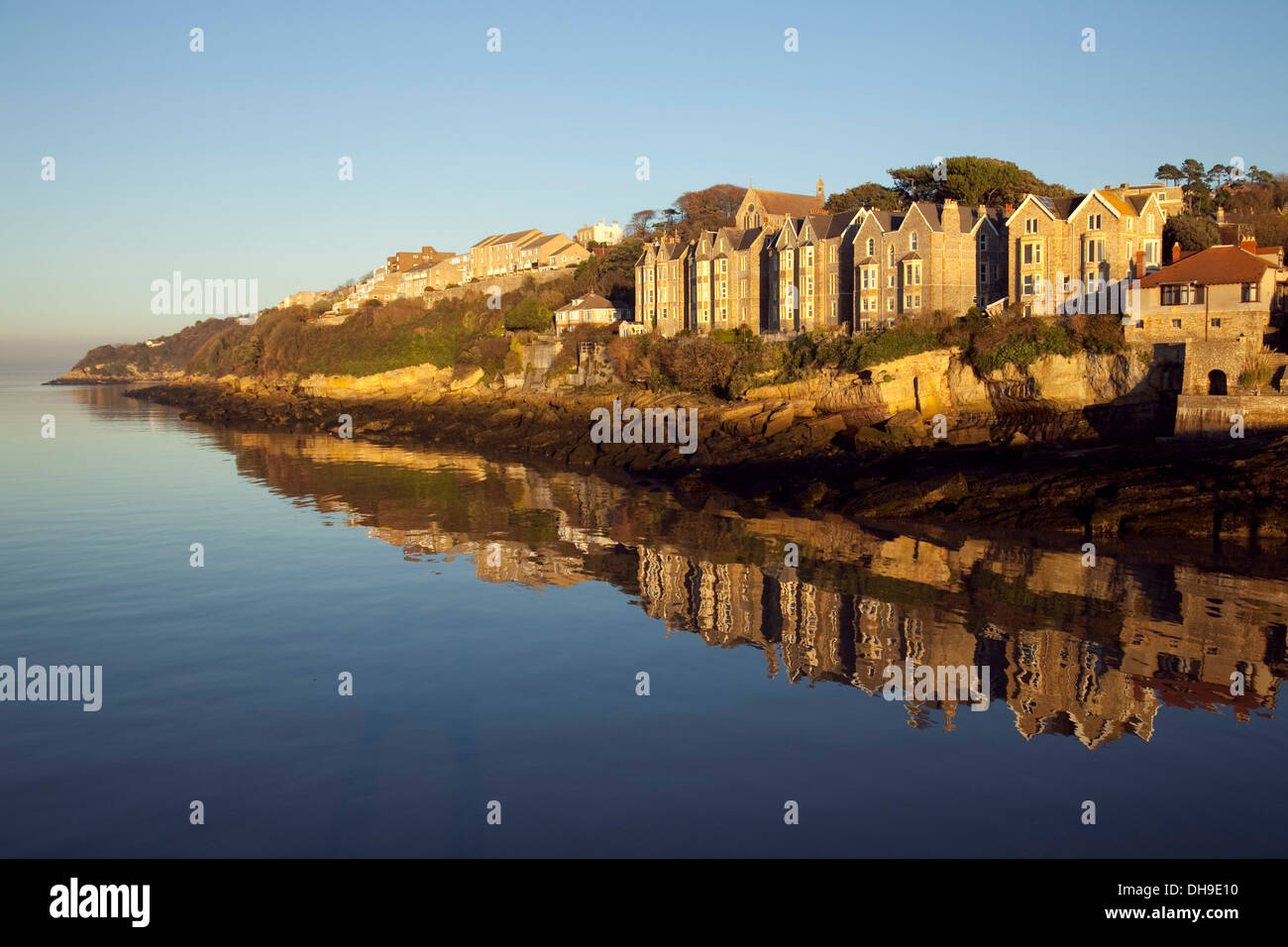 Reflections of house in Clevedon bay Stock Photo - Alamy
