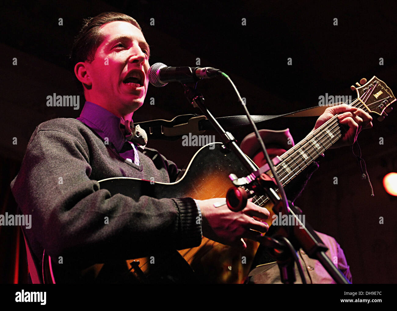 Pokey LaFarge of Pokey LaFarge and South City Three performing on stage ...