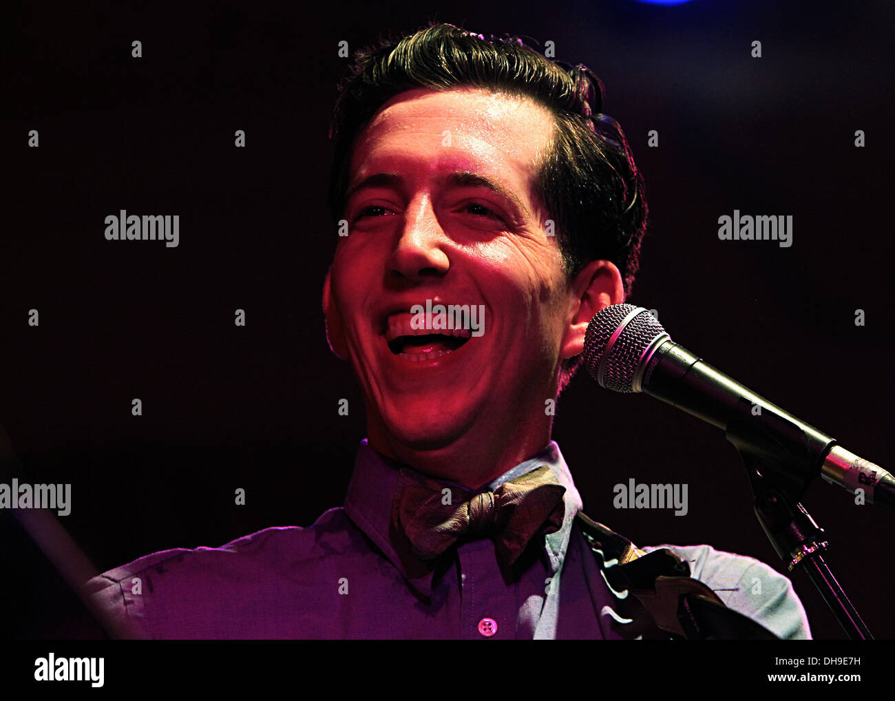 Pokey LaFarge of Pokey LaFarge and South City Three performing on stage ...