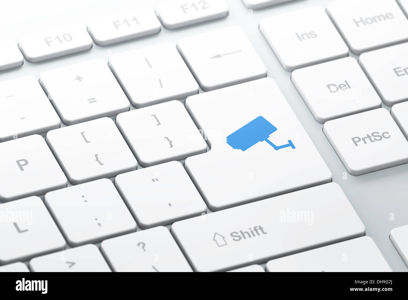 Protection concept: Cctv Camera on computer keyboard background Stock ...