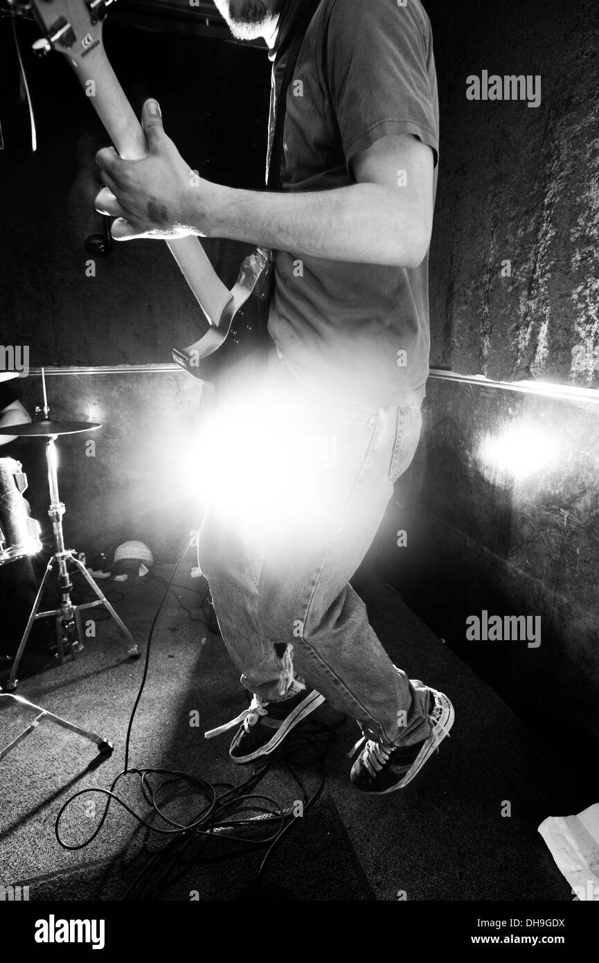 Guitar player jumping in air Black and White Stock Photos & Images - Alamy