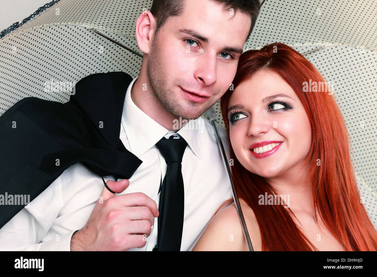 Wedding day. Portrait of happy married couple red haired blue eyed ...