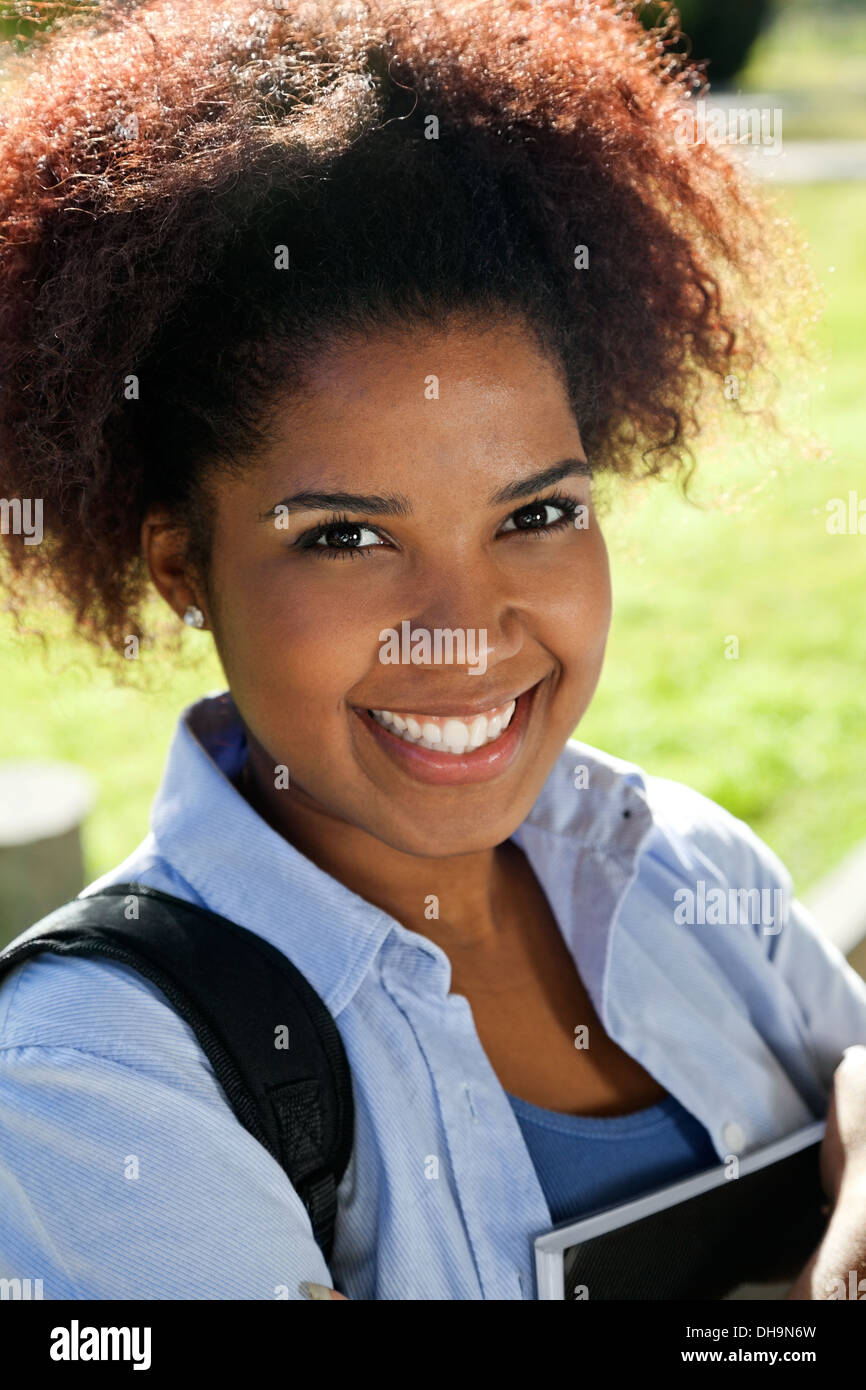 Beautiful Student Smiling On College Campus Stock Photo - Alamy
